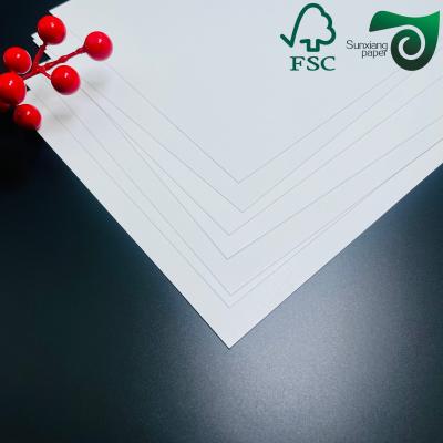 China FSC 235gsm Food Grade White Wrapping Paper Board   For Deep Fried Food Packaging for sale