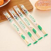 China Custom Logo Round Bamboo Chopsticks Disposable for sale