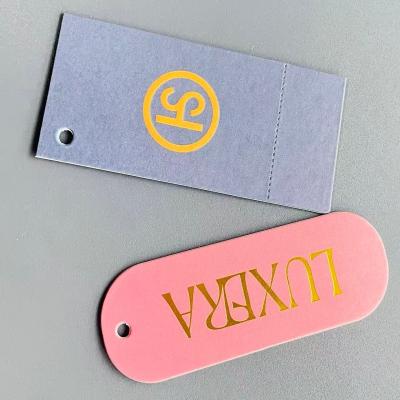 China Snap Lock Clothing Hang Tag Easy To Hanging Tags Offering Practical Garment Identification And Retail Presentation for sale