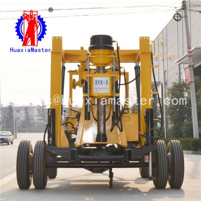 China Xyx-3 trailer hydraulic well drilling rig equipped with wheeled walking mechanism and hydraulic cylinder pillar for sale