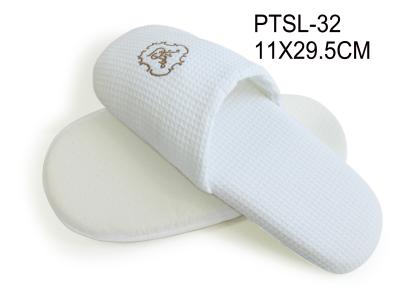 China Waffle Fabric Disposable Hotel Slippers With 10mm Thick Foam Sole for sale