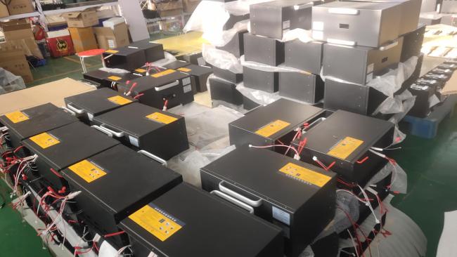 Lithium battery cell production process showing electrode sheets and assembly