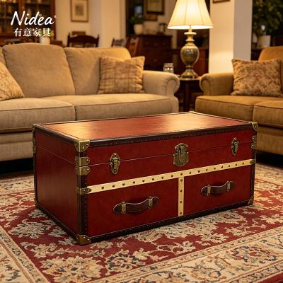 China Vintage Burgundy Faux Leather Steamer Trunk Storage Chest Wood Trim Coffee Table with Antique Hardware for Living Room Hotel Use for sale