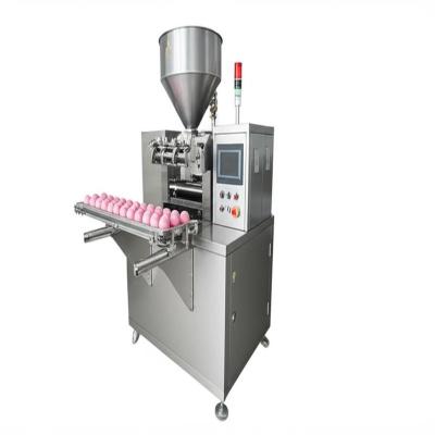 中国 ストロベリー モチ の 自動 塗装 機 で,果物 を 完全 に 処理 し,精密 な 包装, 220V の 電圧 を 備える 販売のため