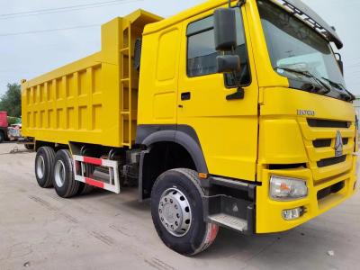 중국 수동 변속기형 시노트럭 HOWO 덤퍼 트럭 10 휠러 노란색 틱링 트럭 판매용