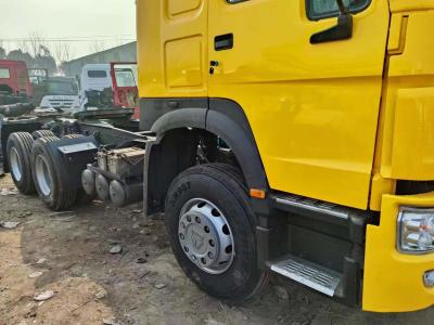 중국 사용 된 노란색 Sinotruk HOWO 6*4 트랙터 트럭 30톤 40톤 수동 변속기와 판매용