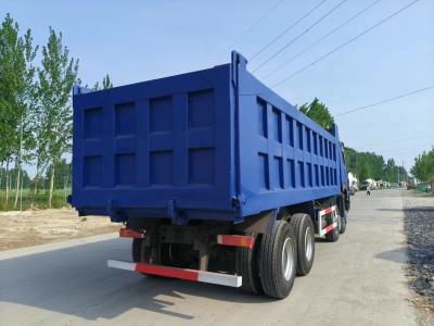 China HOWO Tipper Dumper Trucks 8X4 12 Räder Bergbaudump Truck mit Handgetriebe zu verkaufen