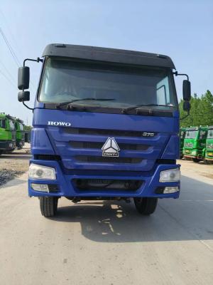 China HOWO Tipper Dumper Trucks 8X4 12 Räder Bergbaudump Truck mit Handgetriebe zu verkaufen