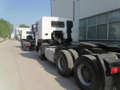 中国 ISO認定 6X4 371HP ディーゼルエンジン付き重型トラクターヘッドトラック Rhd トラクタートラック 販売のため