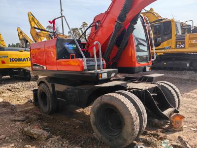 Китай Корейский оригинальный использованный экскаватор на колесах Doosan DX150w-7 с вместимостью в 0,75 м3 продается