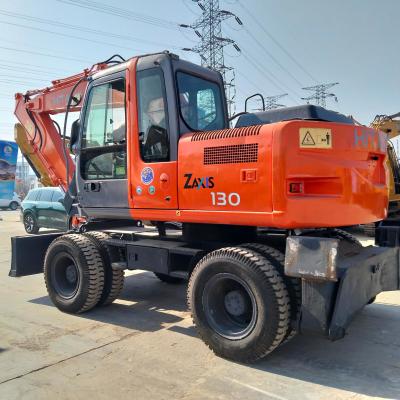 Cina Nuovo arrivo Usato Doosan Zx130W Escavatore a ruote 0,6 M3 Capacità di secchio Escavatore di seconda mano in vendita