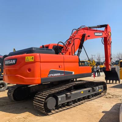 China Koreaanse merk Doosan DX225 Gebruikte graafmachine 22 ton Crawler Hydraulische graver met een emmercapaciteit van 1,28m3 Te koop