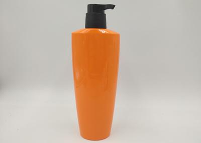 Cina Le bottiglie di plastica del cosmetico dell'ANIMALE DOMESTICO arancio ovale svuotano la superficie di lucentezza della bottiglia del sapone della lozione in vendita