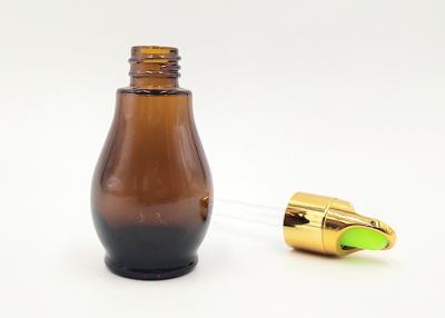 Cina bottiglie cosmetiche di vetro di colore ambrato 30ml con il cappuccio dorato per olio essenziale in vendita