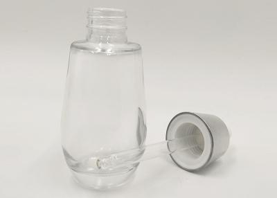 中国 1oz 30mlは点滴器のびん、金/銀の帽子ガラス ローションのびんを取り除きます 販売のため