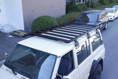Cina Installazione Nissan Patrol Y60 4X4 Traverse del tetto con pinza per l'acqua di pioggia in vendita