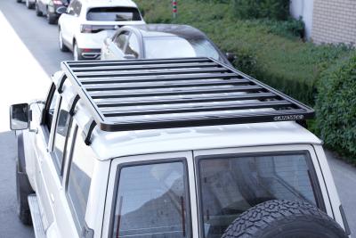 Cina Installazione Nissan Patrol Y60 4X4 Traverse del tetto con pinza per l'acqua di pioggia in vendita