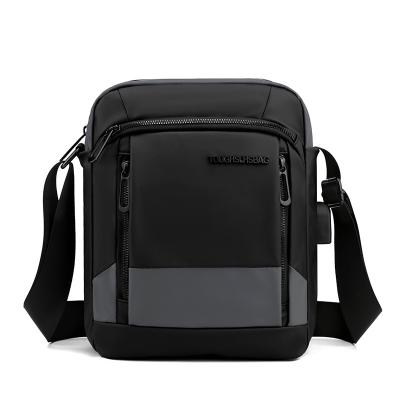 China Men's Casual Bag Business Fashion Waterproof Men's Shoulder USB Function Messenger Bag Briefcase Filling Briefcase factory