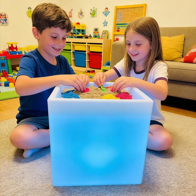 Child playing with LED sensory tray