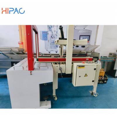 China Electric Automatic Carton Sealer and Strapping Machine for Energy Saving High Efficiency Packaging for sale