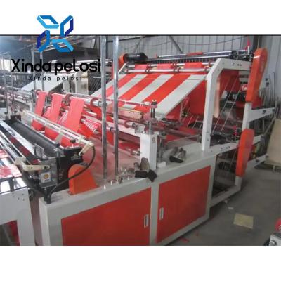 China Automatic Carry Bag Making Machine 220V Plastic Bag Cutting Machine With Auto Belt Conveyor for sale