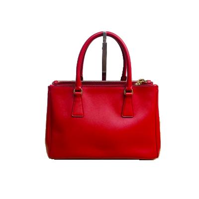 red leather handbag