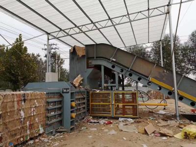 China YDWB150 Horizontal Type Semi-Automatic Baler with Conveyor for pressing waste paper into bale for sale
