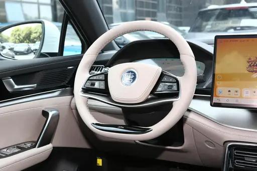 The New Byd Tang Electric EV Champion Edition 730km Range Pure Electric SUV Drives Front-Wheel-Drive on The Left Side