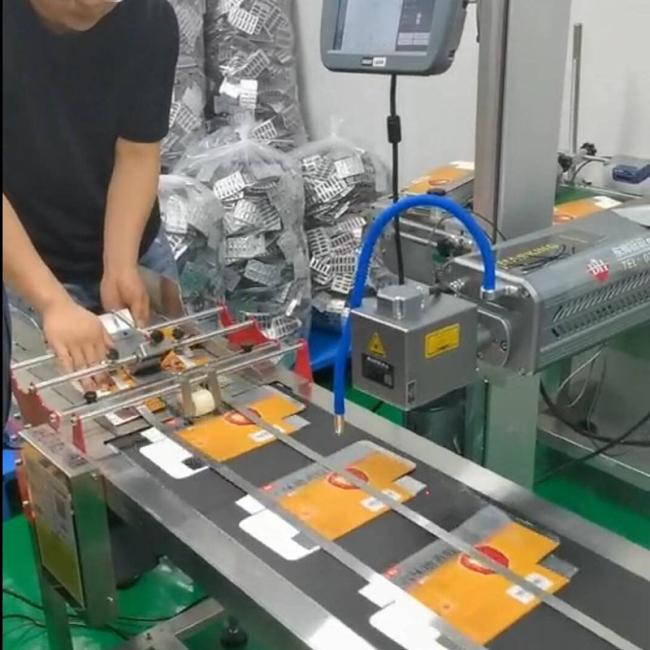 CO2 flying laser marker can automatically encode and print serial and batch numbers