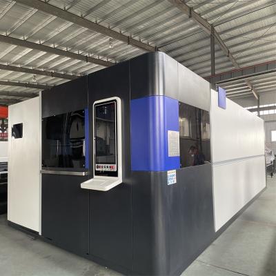 Cina Protezione a chiusura completa 12000w Cnc Fibra di metallo Laser Cutting Machine per acciaio inossidabile in vendita