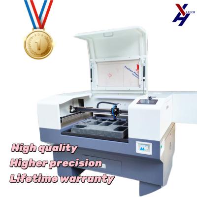 China CO2-lasergraver en -snijdmachine voor MDF-papier for sale