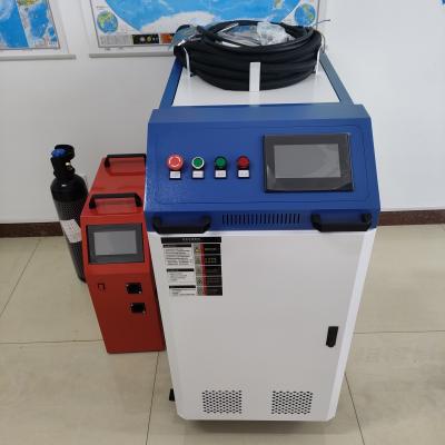 Cina Saldatrice e Taglio Laser a Fibra Portatile per Acciaio Inossidabile 1000W/1500W/2000W in vendita