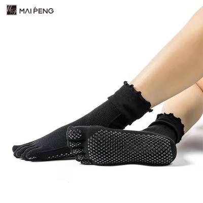 Cina Donne calze da yoga con manette a sfregamento non scivolante calze da pilates con presa a cinque dita in vendita