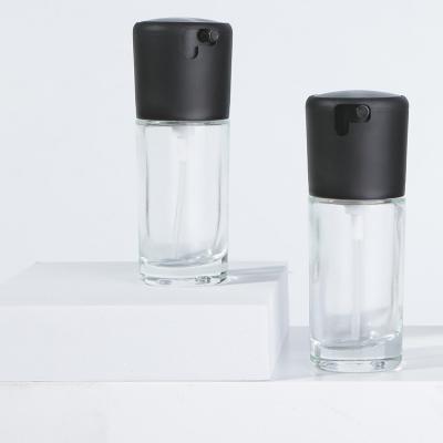 Cina Essenza trasparente della lozione del fondamento della bottiglia di plastica riutilizzabile personalizzabile della pompa 30ml in vendita