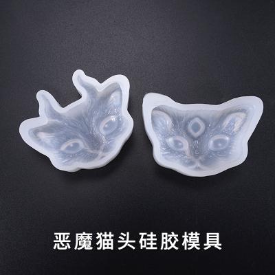 China Crystal dropper mold DIY jewelry high gloss three eye cat head semi three-dimensional angled cat head silicone mold for sale