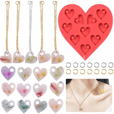 China Drip glue DIY resin perforated heart-shaped pendant earrings silicone mold love Valentine's Day chocolate grinder for sale