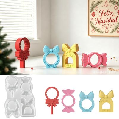 China Hollow-out Bowknot Candy Gift Tag Silicone Mold DIY Aroma Diffuser Pendant Epoxy Mold for sale