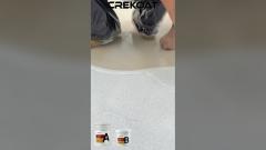 That’s epoxy colored sand floor paint. Not fragile. Not fading. Not peeling.