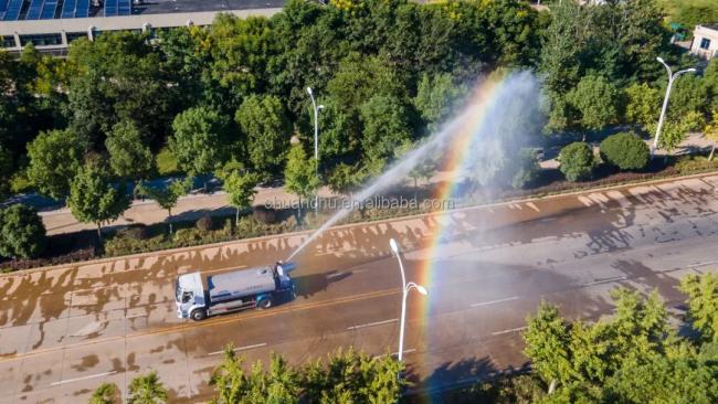 Dust suppression truck at work site