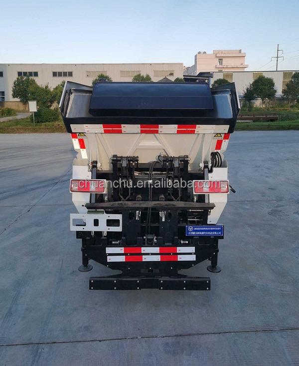 Pure electric self-loading garbage truck in operation