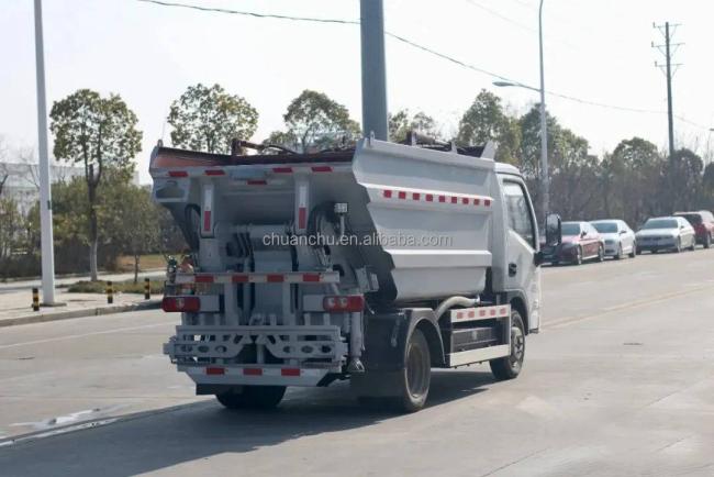 Pure electric self-loading garbage truck loading mechanism