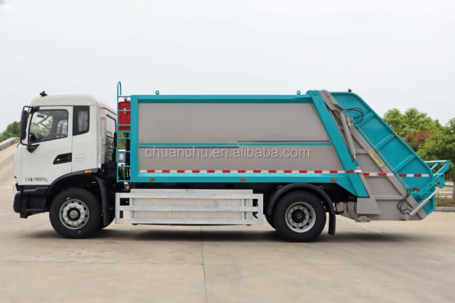 Side view of garbage truck