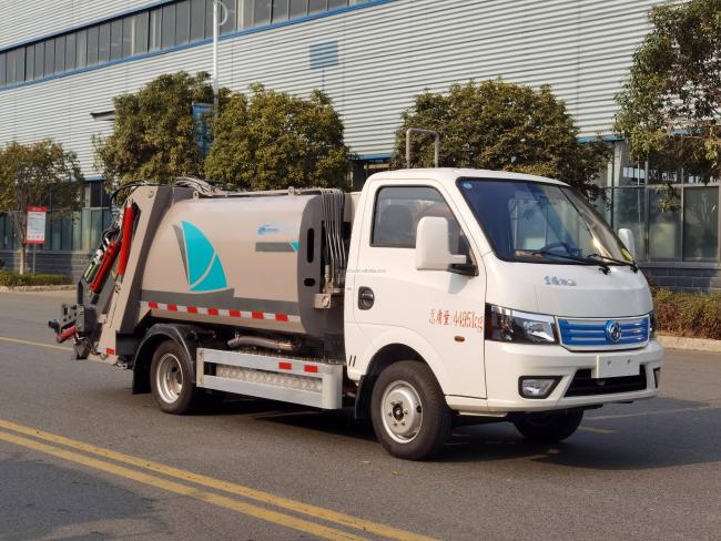 Pure electric compression garbage truck front view