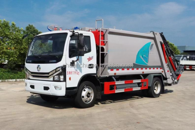 Compressed garbage truck rear view