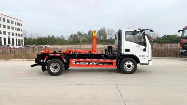 Hook arm garbage truck loading mechanism