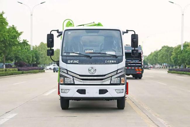 Self-loading garbage truck front view