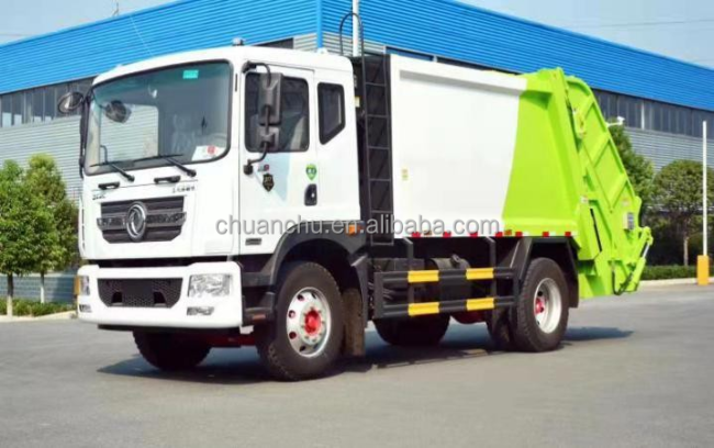 Waste collection garbage compactor truck side view