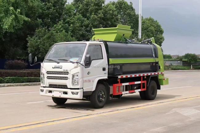 JMC garbage truck side view