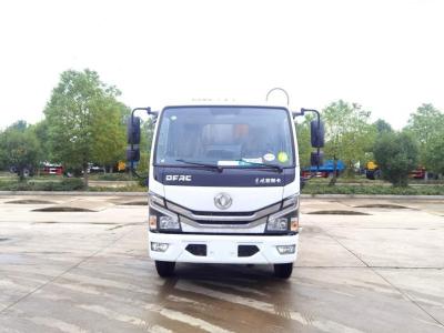 China Diesel Four Wheel Garbage Truck With Rear Loading And Unloading Compression Bucket Automatic Loading Collection Vehicle for sale