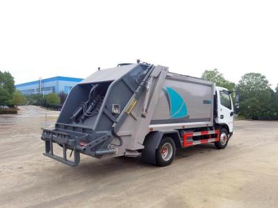 China Diesel Four Wheel Garbage Truck With Rear Loading And Unloading Compression Bucket Automatic Loading Collection Vehicle for sale